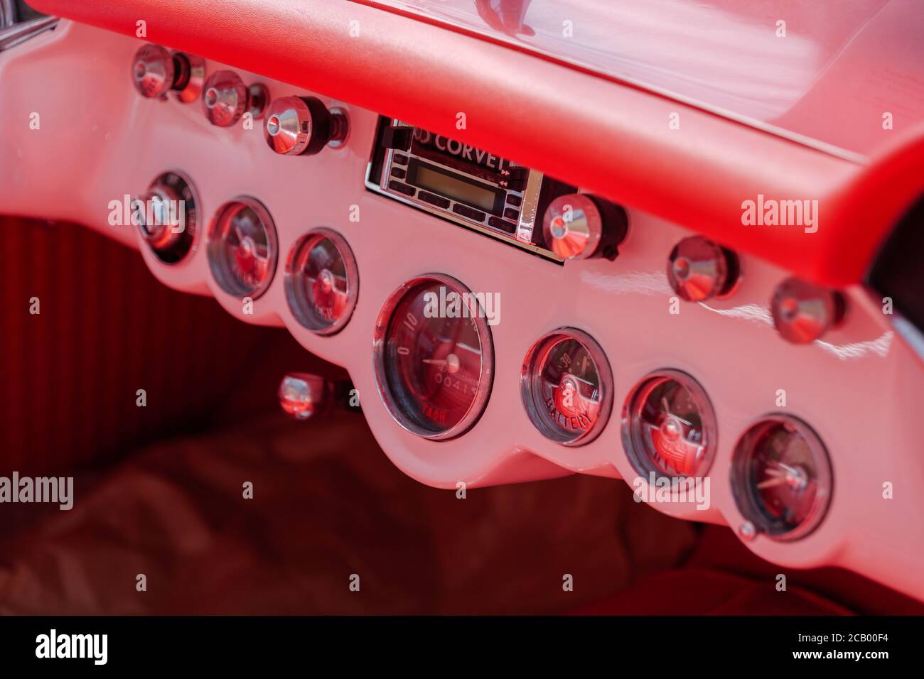 Vintage detail of gauge, switches, button, meter and steering wheel on ...