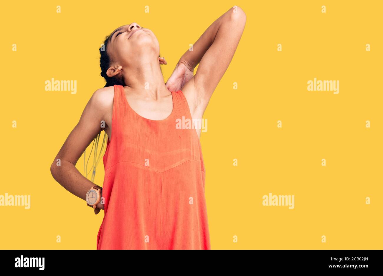 Cute african american girl wearing casual clothes suffering of neck ...