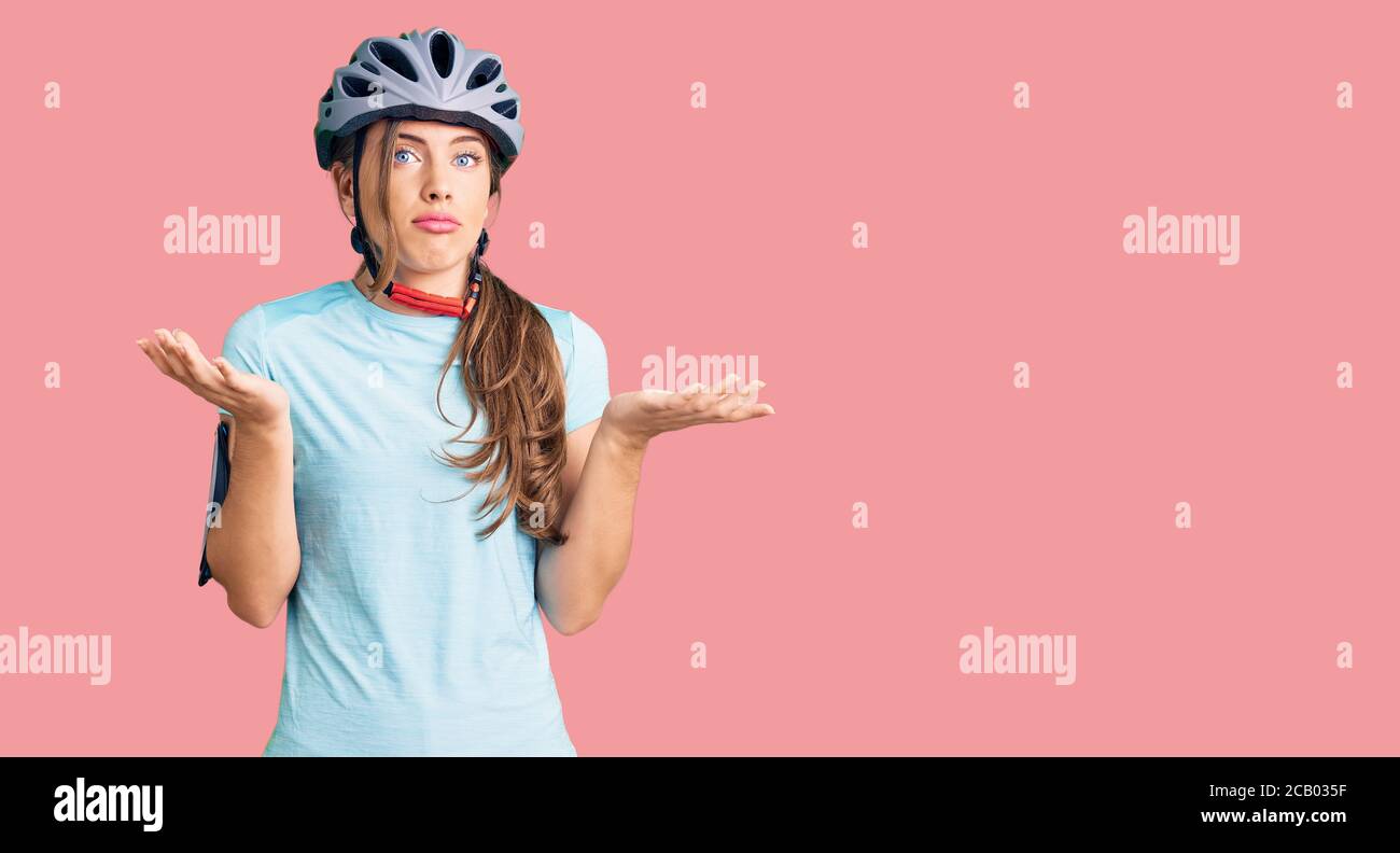 Confused female cyclist hi-res stock photography and images - Alamy