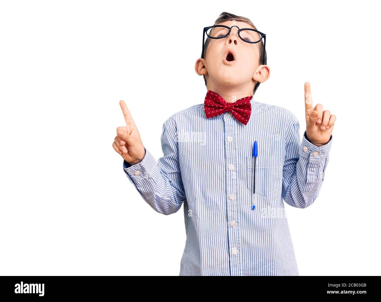 Cute blond kid wearing nerd bow tie and glasses amazed and surprised ...