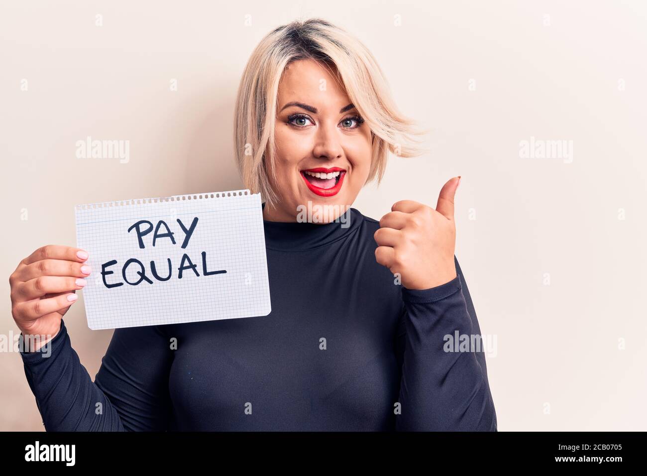 Beautiful plus size woman asking for equality economy holding paper ...