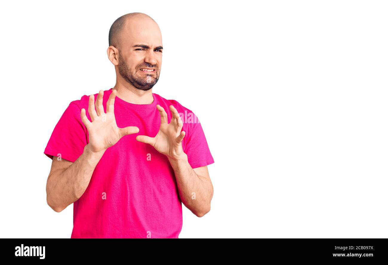 Young handsome man wearing casual t shirt disgusted expression ...