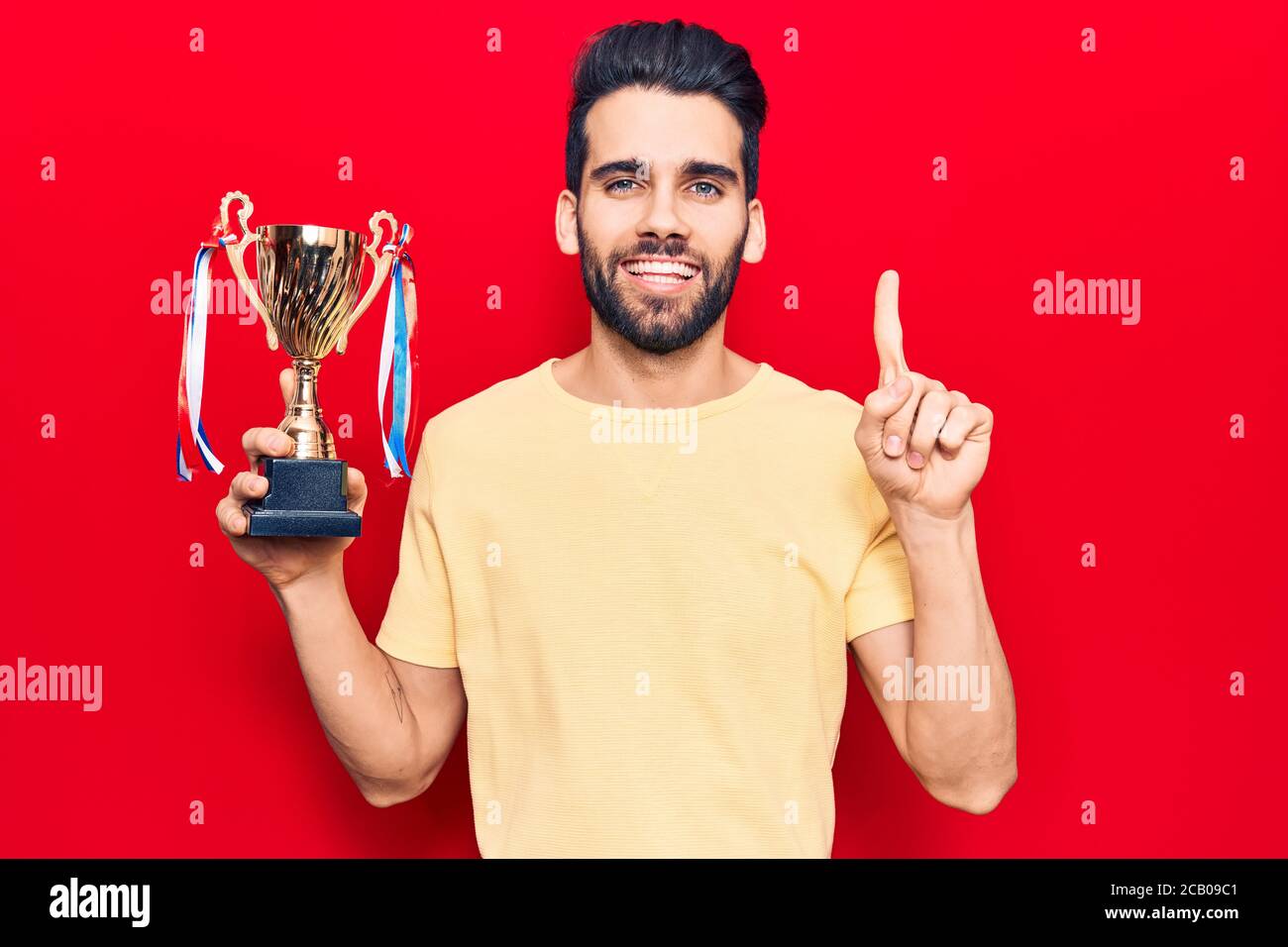 Celebration pointing number one winner hi-res stock photography and ...