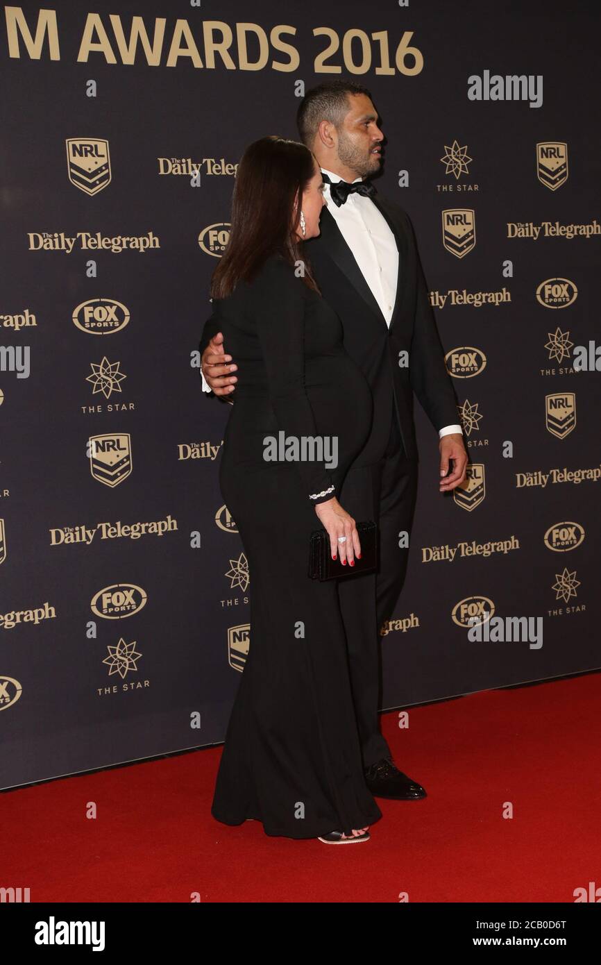 Greg Inglis of the Rabbitohs and pregnant wife Sally Robinson arrive on ...
