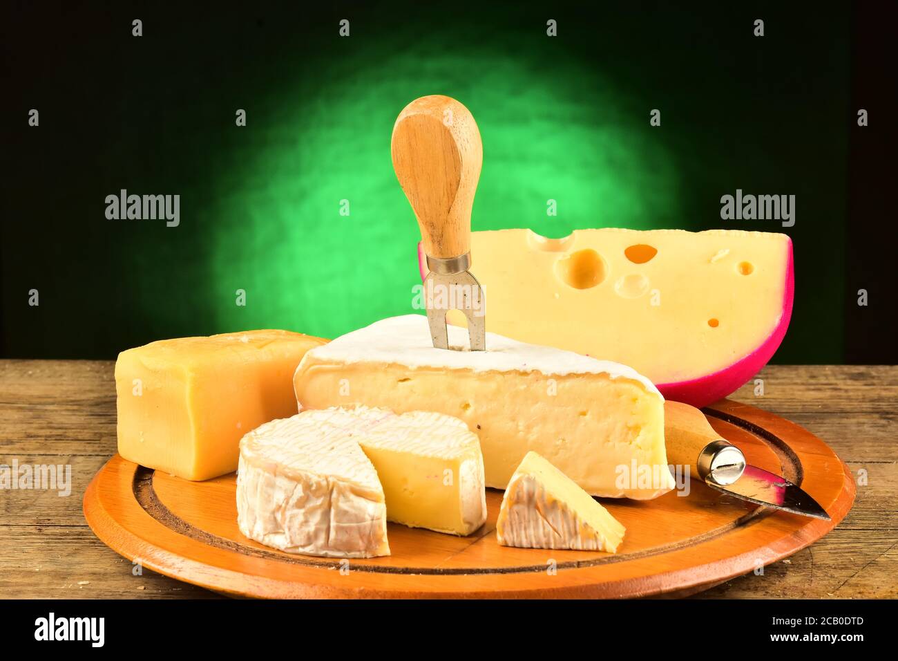 Table of mixed cheese on a studio shot Stock Photo - Alamy