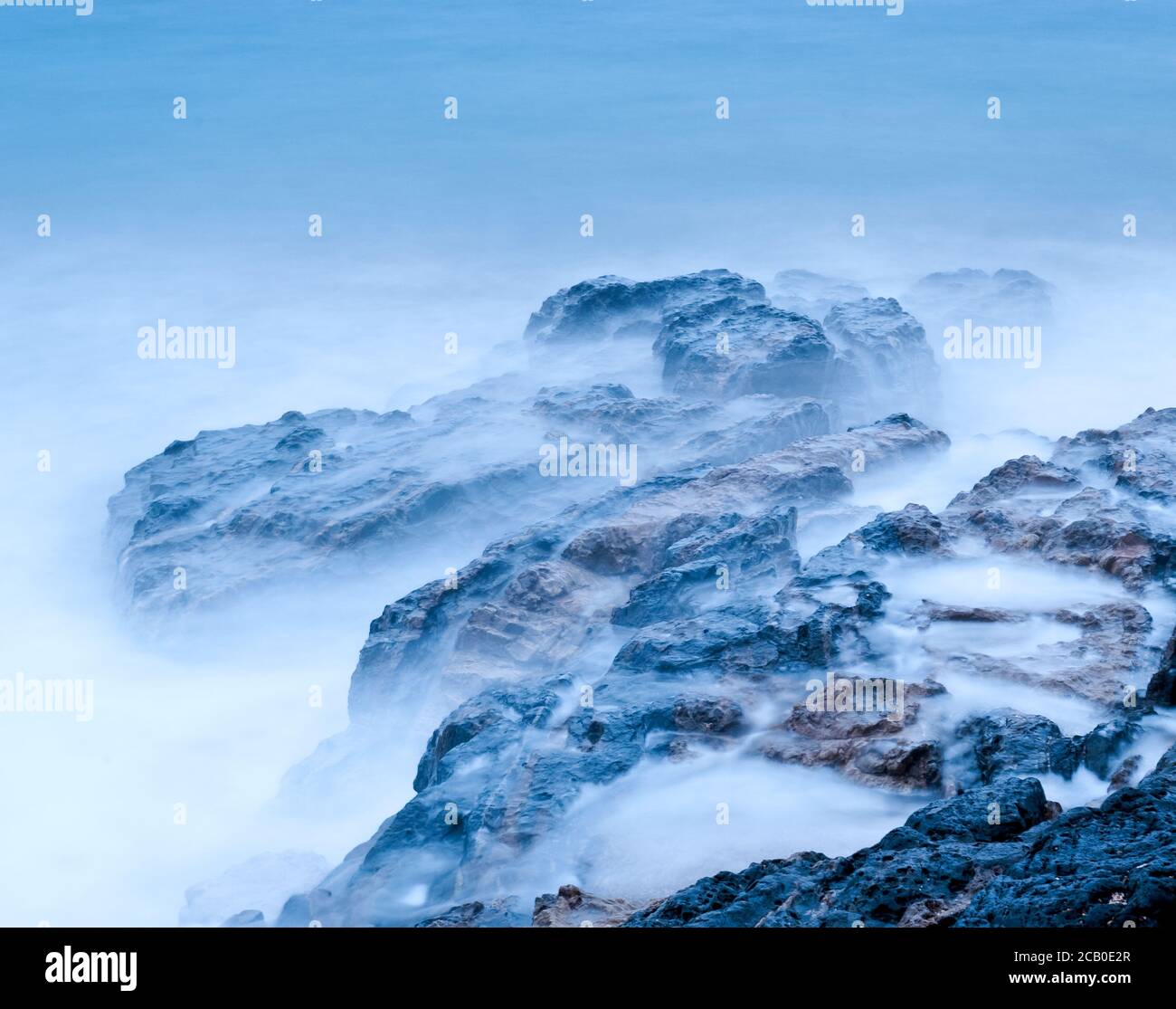 spooky looking water over rocks Stock Photo - Alamy
