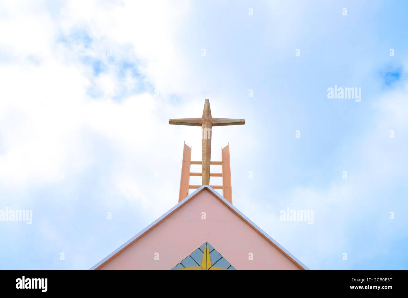 Cross on a church roof, white clouds and blue sky in bacground Stock ...