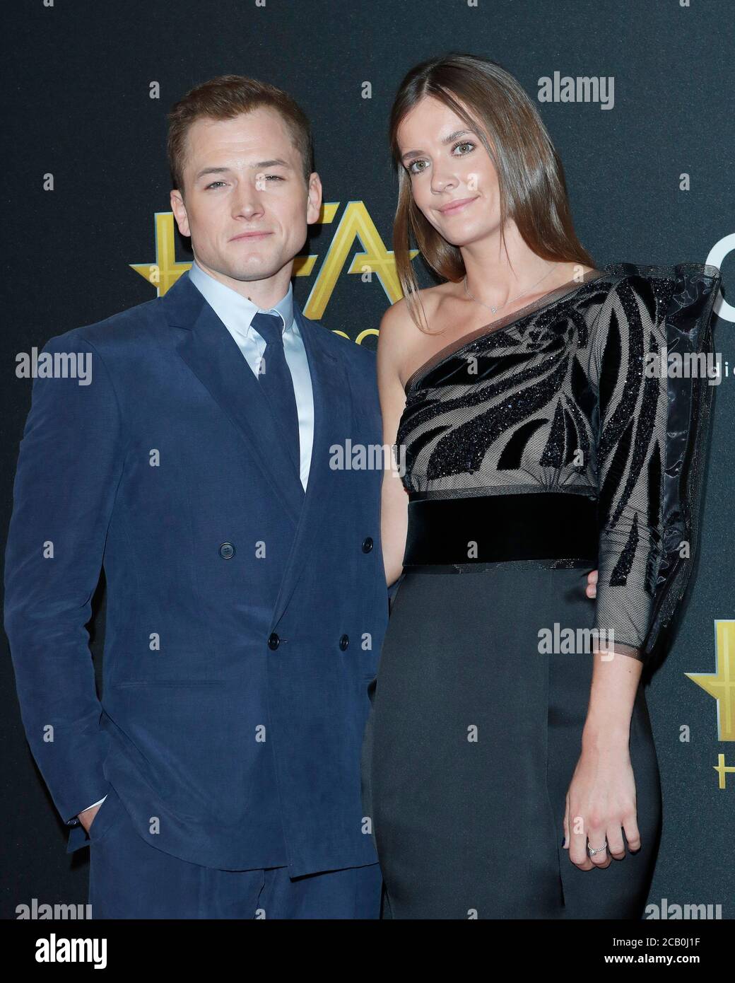 LOS ANGELES - NOV 3: Taran Egerton, Emily Thomas at the Hollywood Film ...