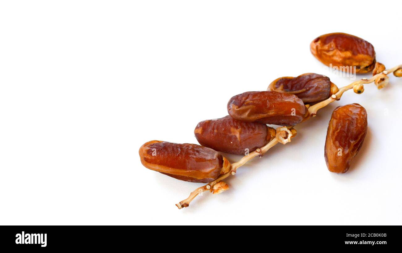 Dates fruit isolated on a white background. Top view. Flat lay pattern ...