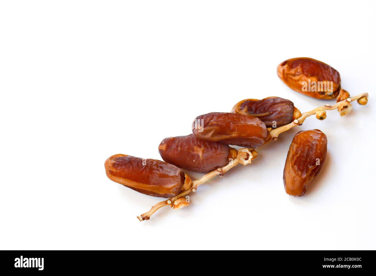 Dates fruit isolated on a white background. Top view. Flat lay pattern ...