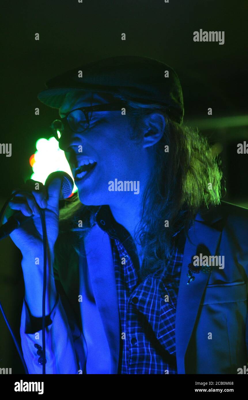 Rock singer long hair hi-res stock photography and images - Alamy