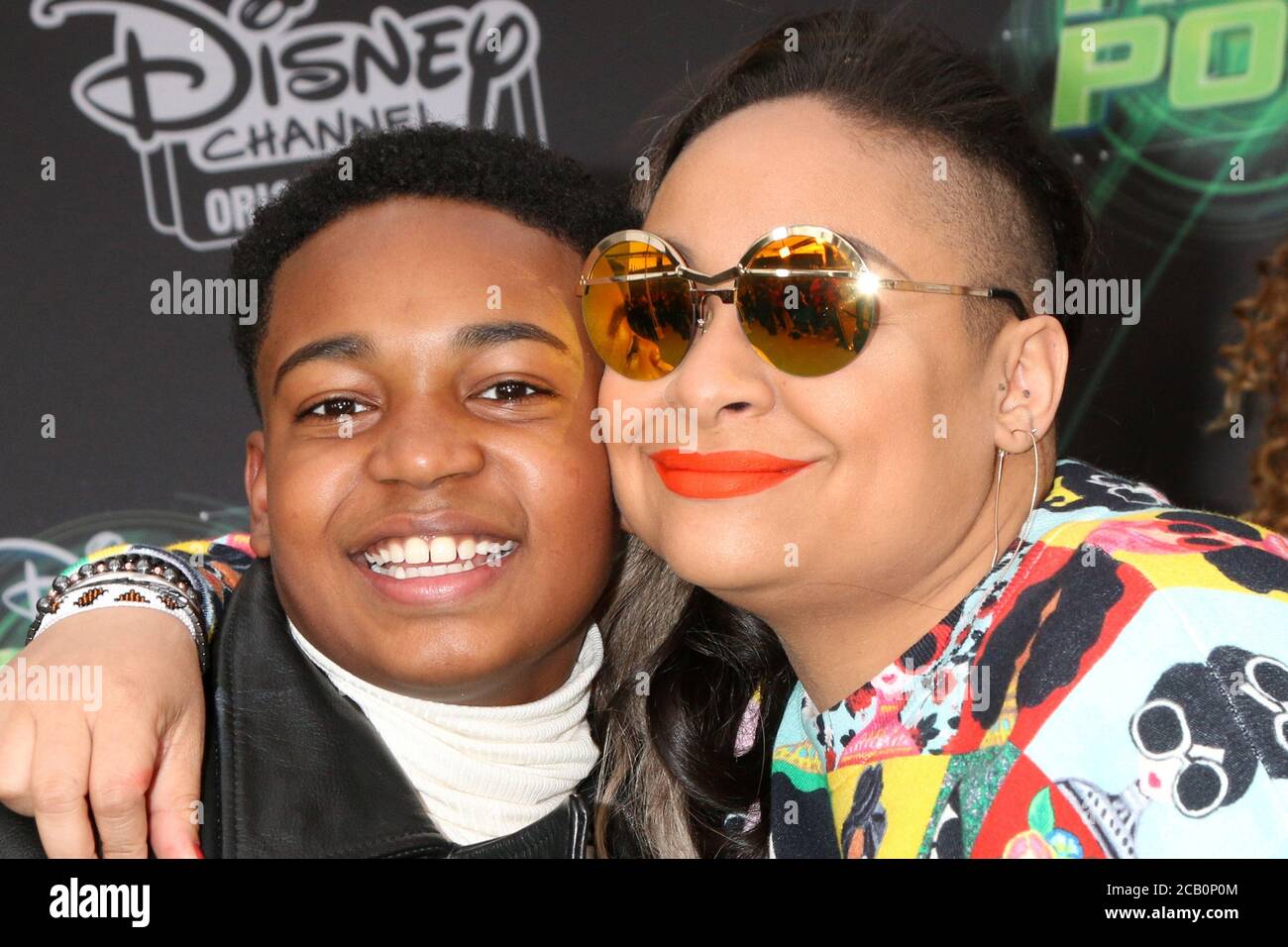 LOS ANGELES - FEB 12: Isaac Ryan Brown, Raven-Symone at the "Kim ...