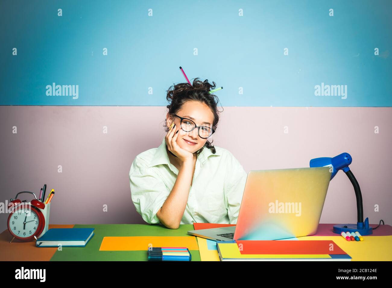 Female student in college. Students with computer studying at school ...