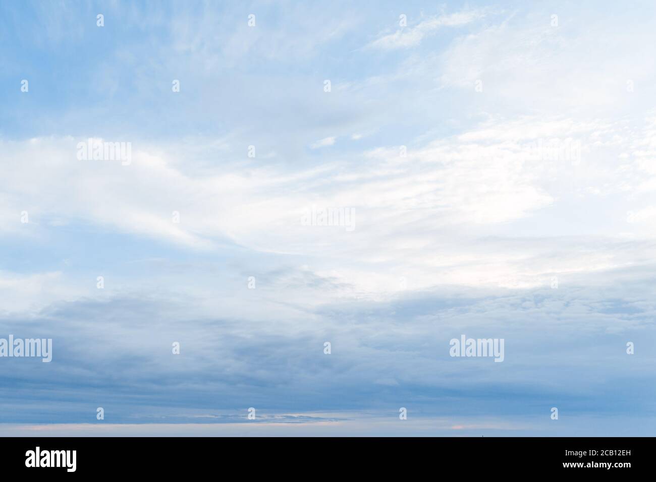 Blue sky with white clouds. Background from the cloudy sky. Long and ...