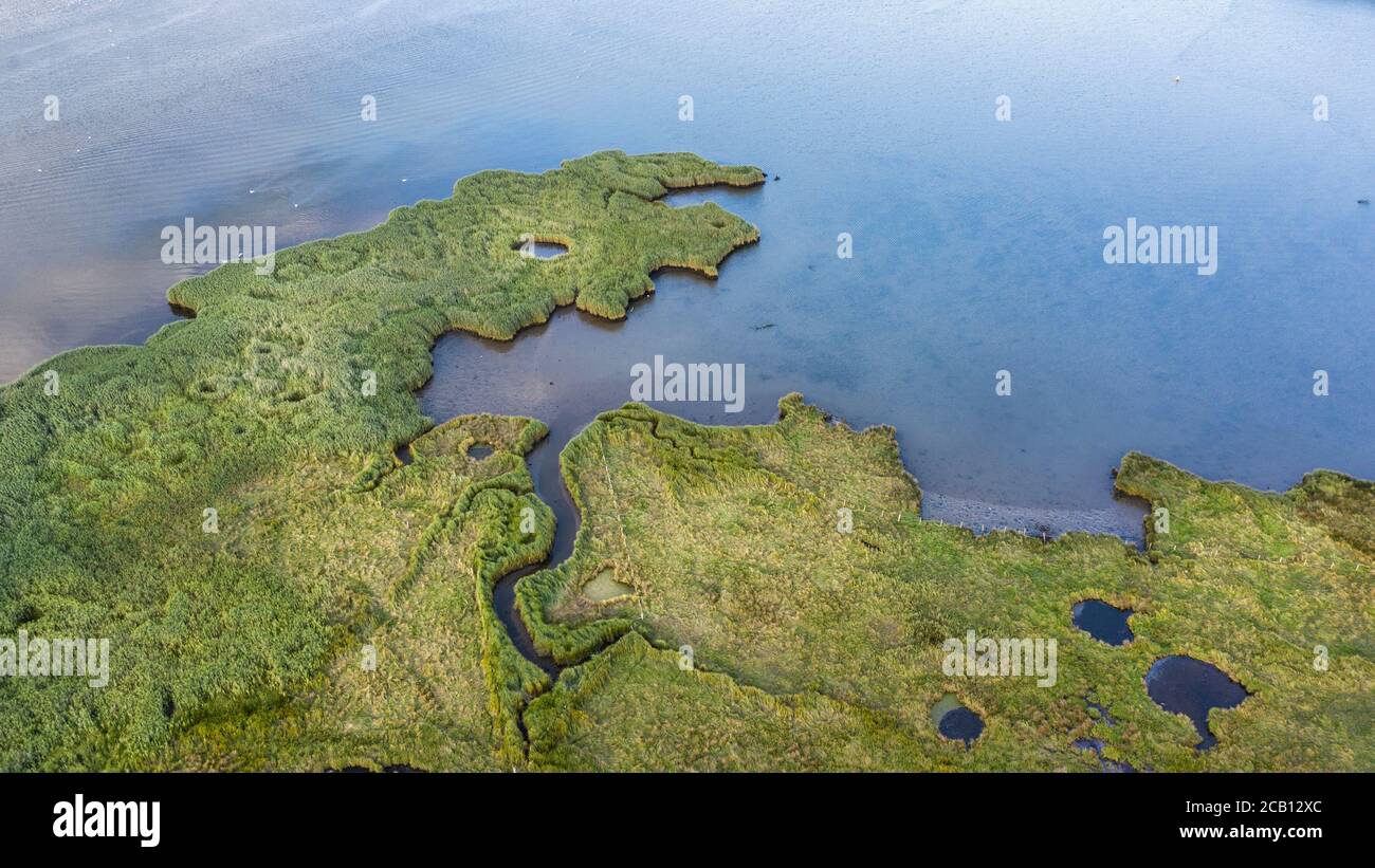 Drone top down bird's eye view landscape image of tidal wetlands in ...