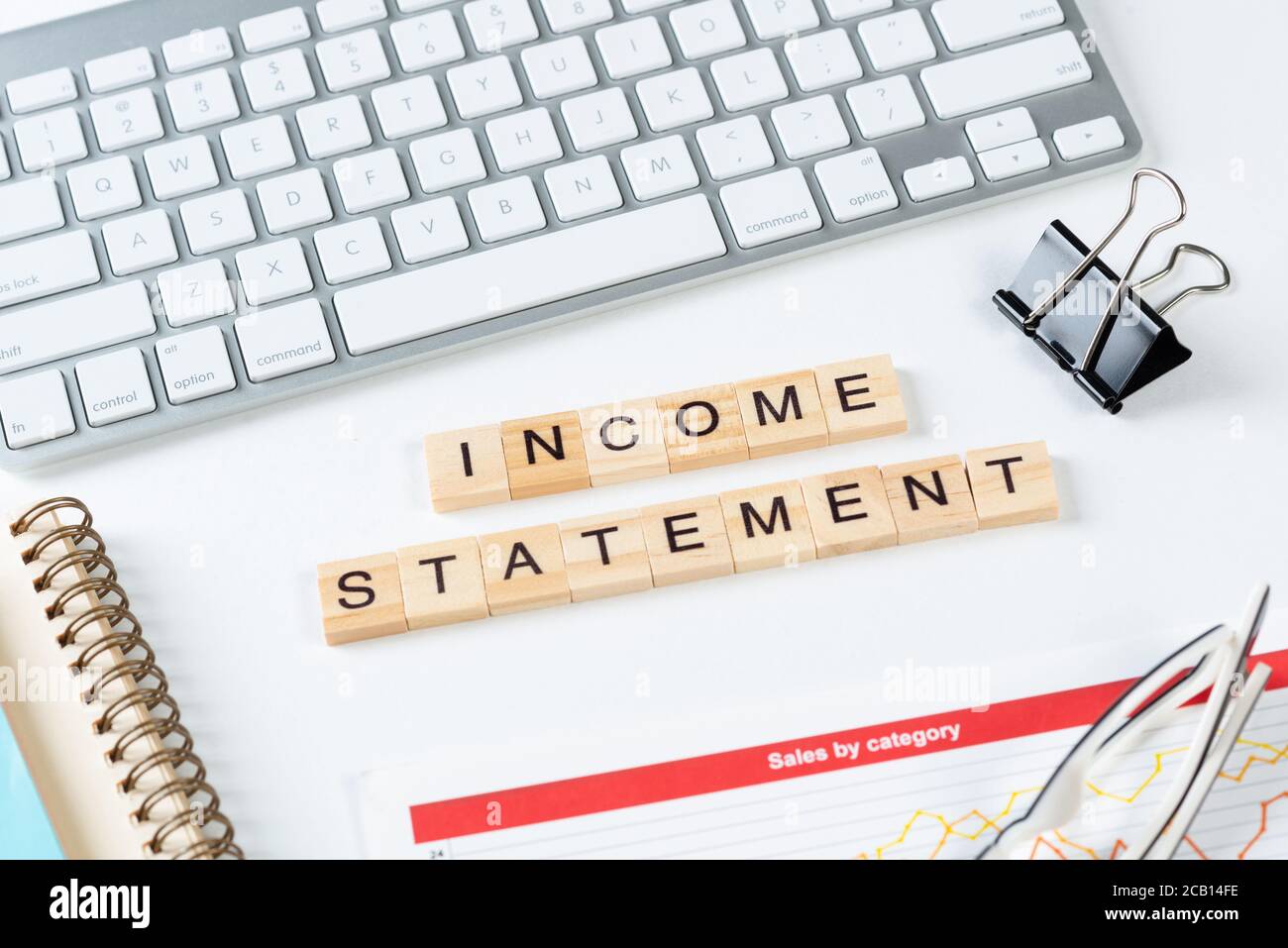 Income statement concept with letters Stock Photo - Alamy