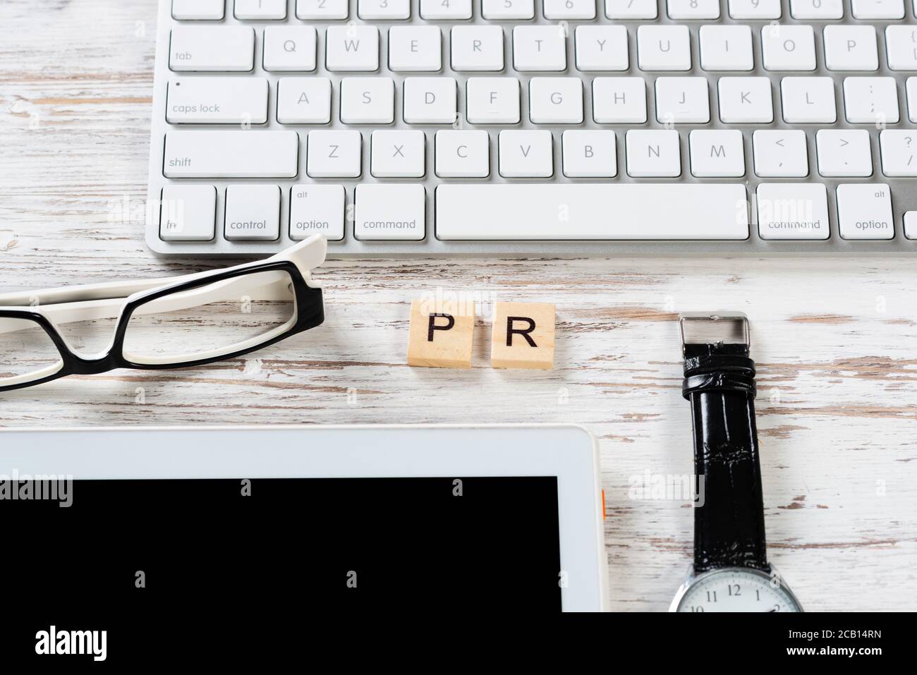 Public relations concept with PR letters on cubes Stock Photo - Alamy