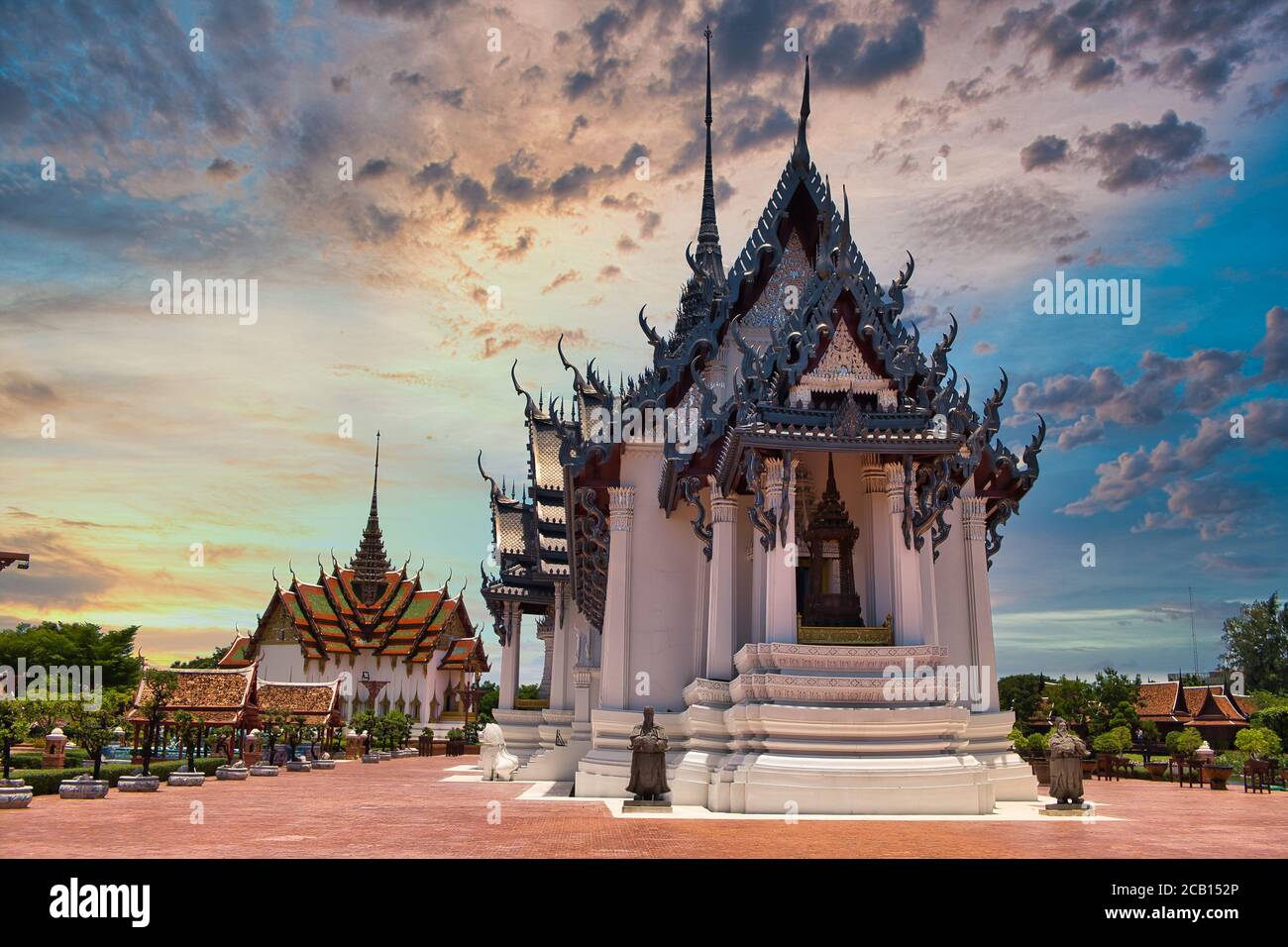 Thai Temple at sunset Stock Photo - Alamy