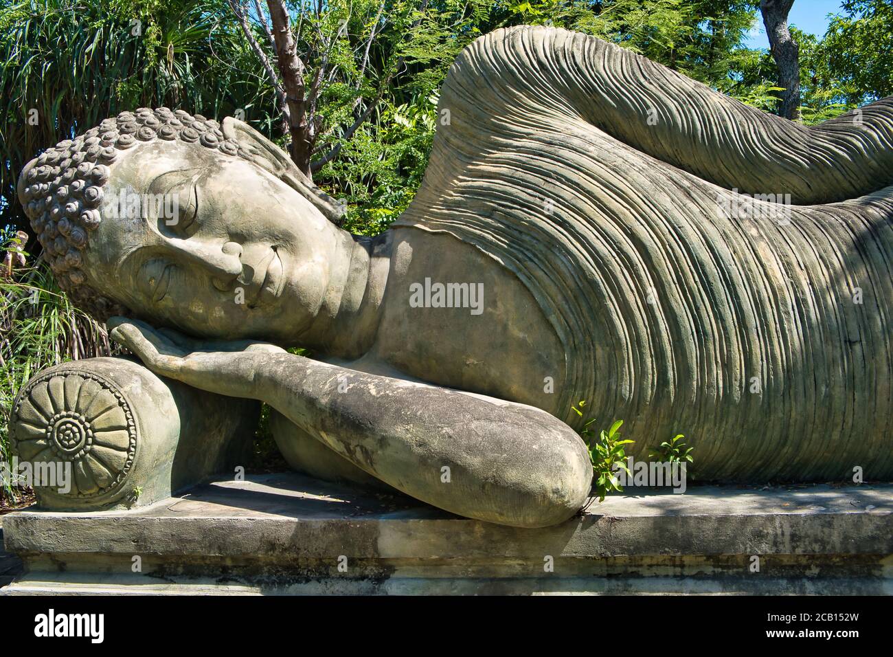 Buddha face stone statue Stock Photo - Alamy