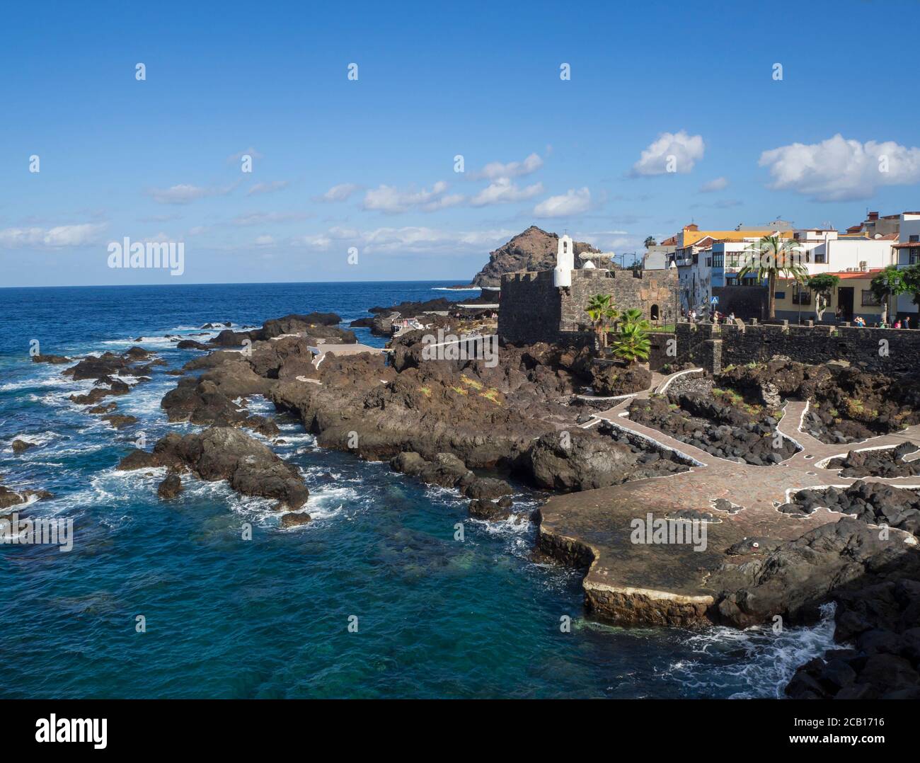 View on Garachico panorama with sea pools and lava rocks village center ...