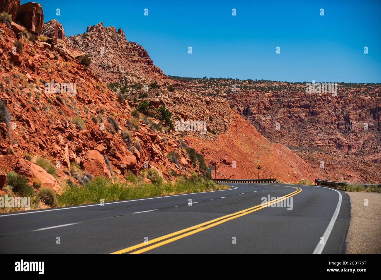 American road trip. Asphalt road and canyon background Stock Photo - Alamy