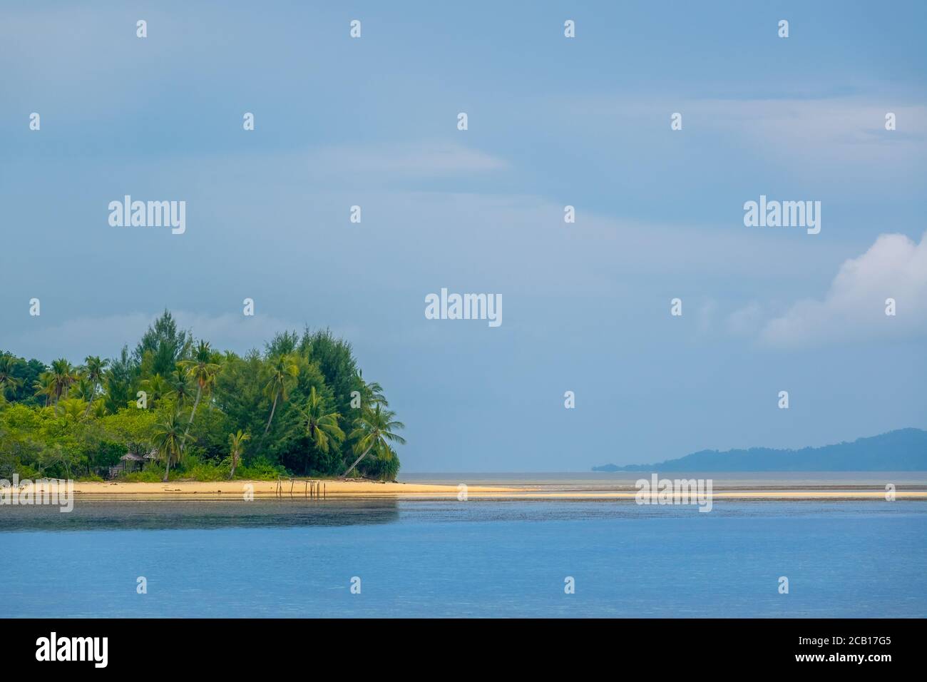 Indonesian island in the Raja Ampat archipelago. An empty sandbar on ...