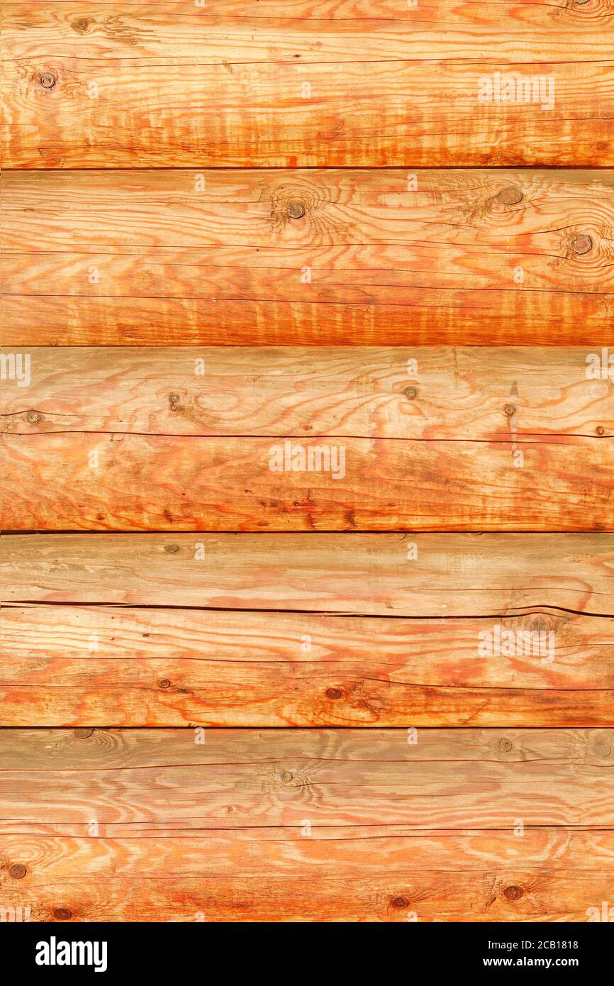 Wall of logs. Horizontal arrangement. Close-up Stock Photo - Alamy