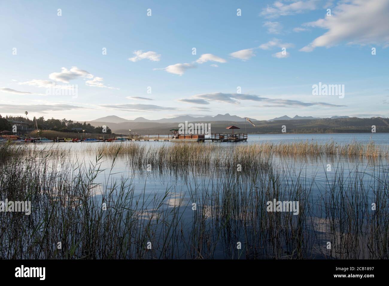 View over big estuary with mountain range in the background and ...