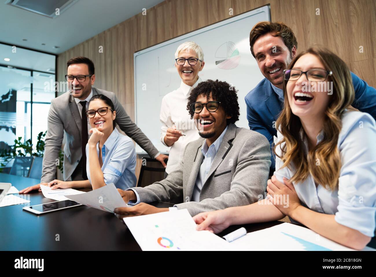 Business colleagues in conference meeting room during presentation ...