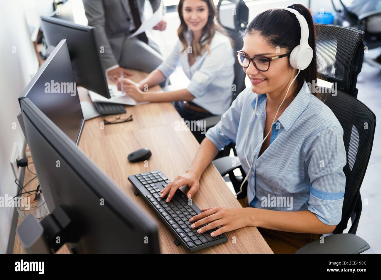 Programmer working in a software developing company Stock Photo - Alamy