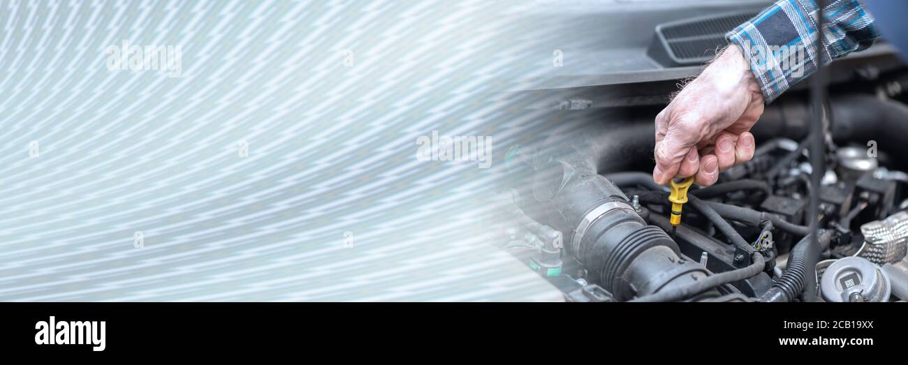 Car mechanic checking a car engine; panoramic banner Stock Photo - Alamy