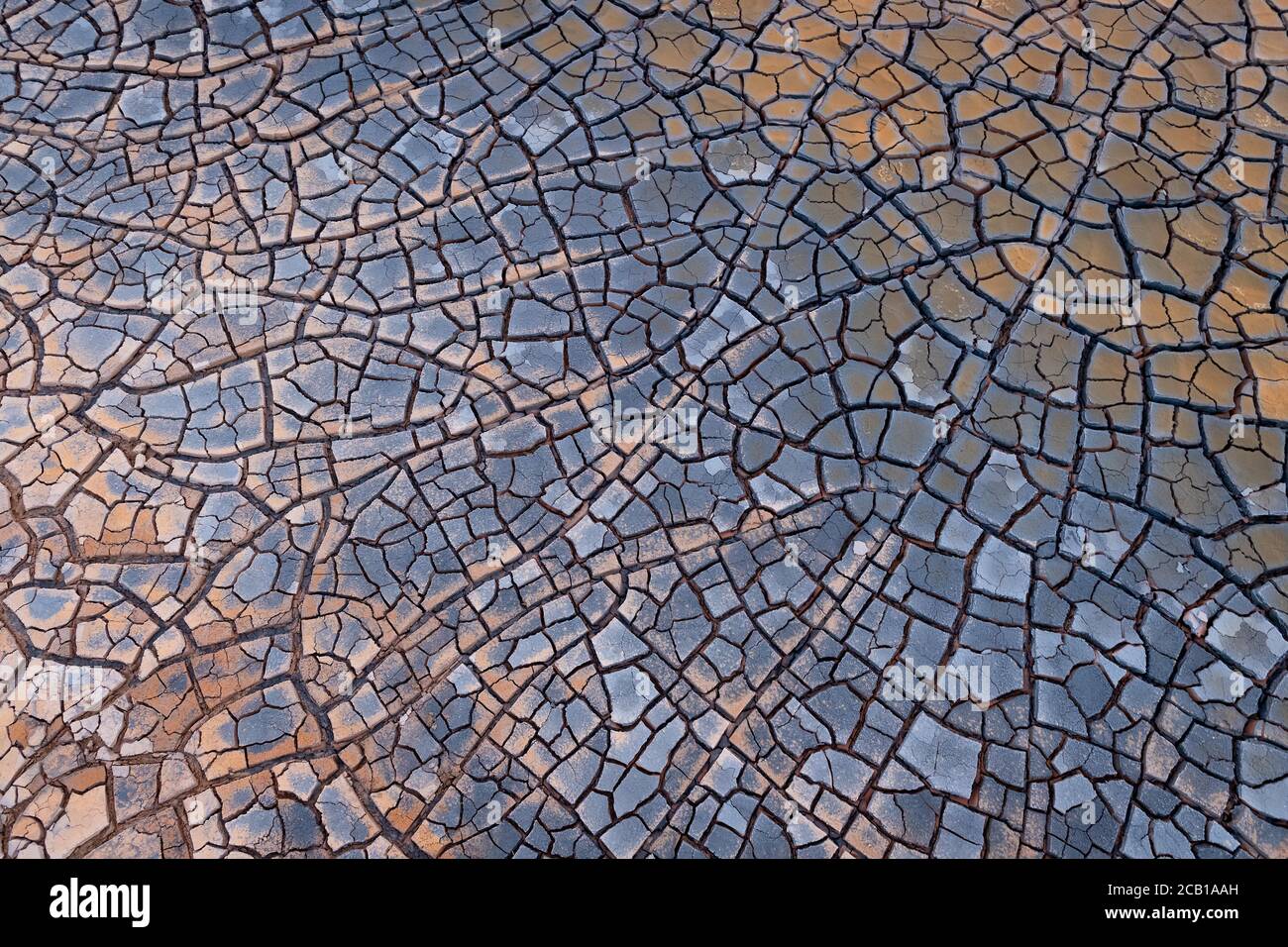 Cracks in clay soil form mosaic-like structure, geothermal field ...