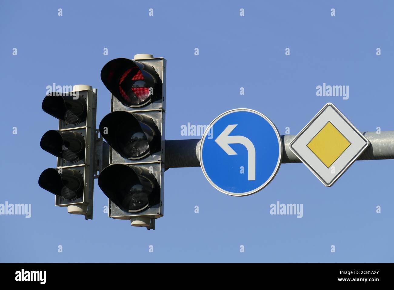 Traffic lights with traffic signs, Germany Stock Photo - Alamy