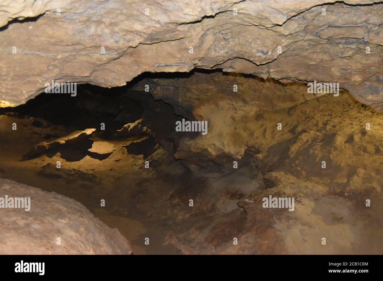 Creepy and rocky underground cave Stock Photo - Alamy
