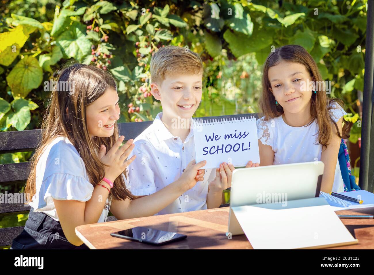 Online children hi-res stock photography and images - Alamy