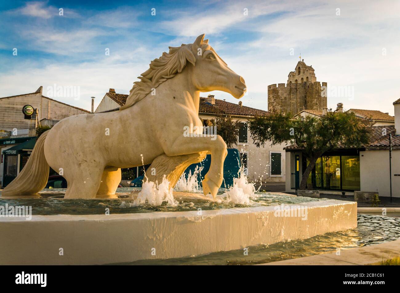 Statue of white camargue horse in Saintes Maries de la Mer, France ...