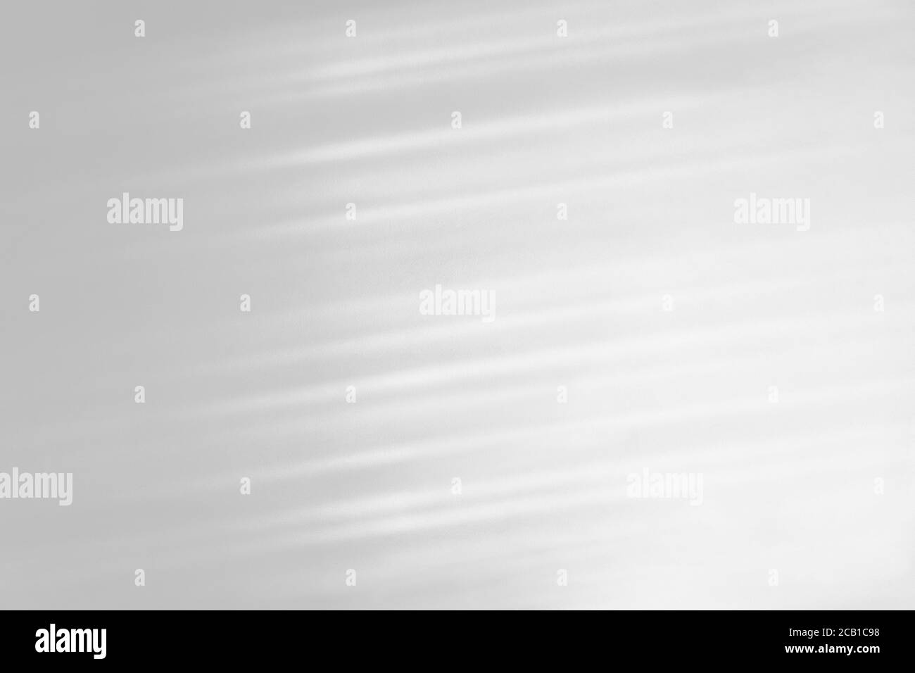 Organic drop shadow on a white wall Stock Photo - Alamy
