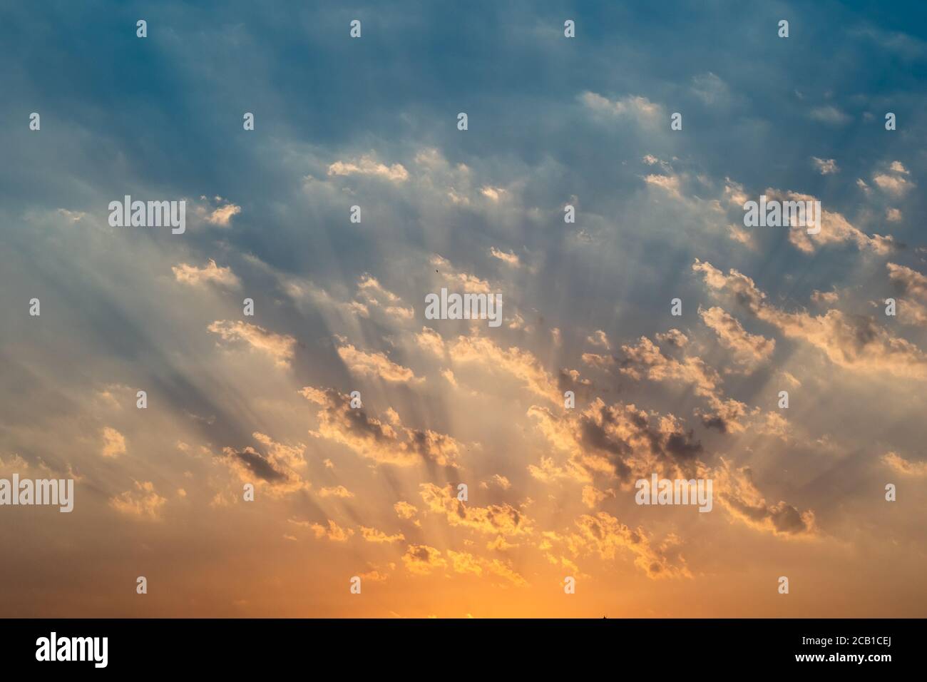 Sun rays breaking through clouds in a dramatic, inspirational scene ...