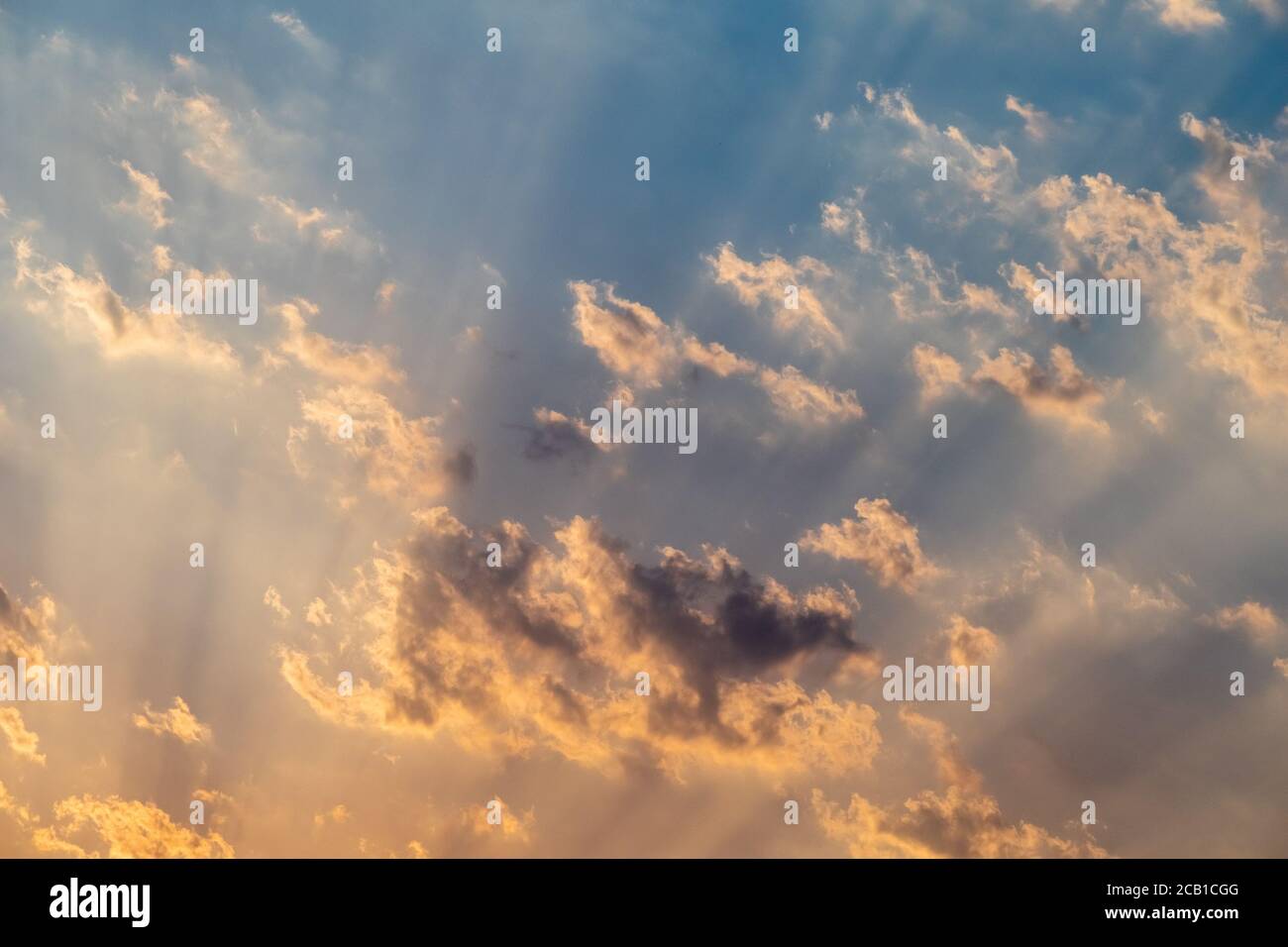Clouds with sunburst breaking through hi-res stock photography and ...