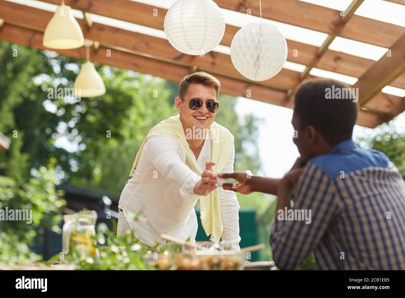 Talking across table dinner hi-res stock photography and images - Alamy