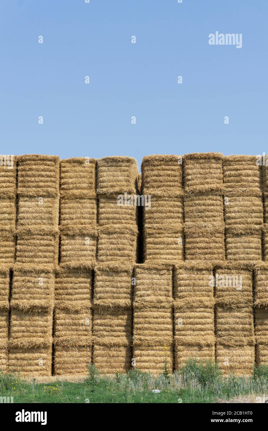 Hay stack uk farm six levels sunny blue sky bales fallen over Stock ...