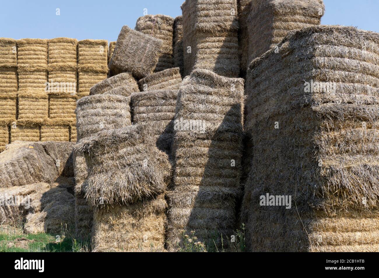 Hay stack uk farm six levels sunny blue sky bales fallen over Stock ...