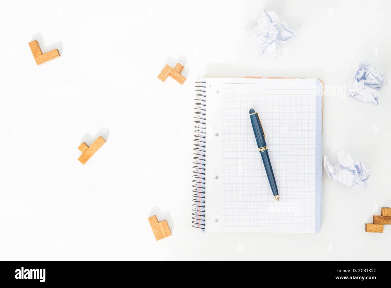 Puzzle, pencil, notebook and crumpled paper Stock Photo - Alamy