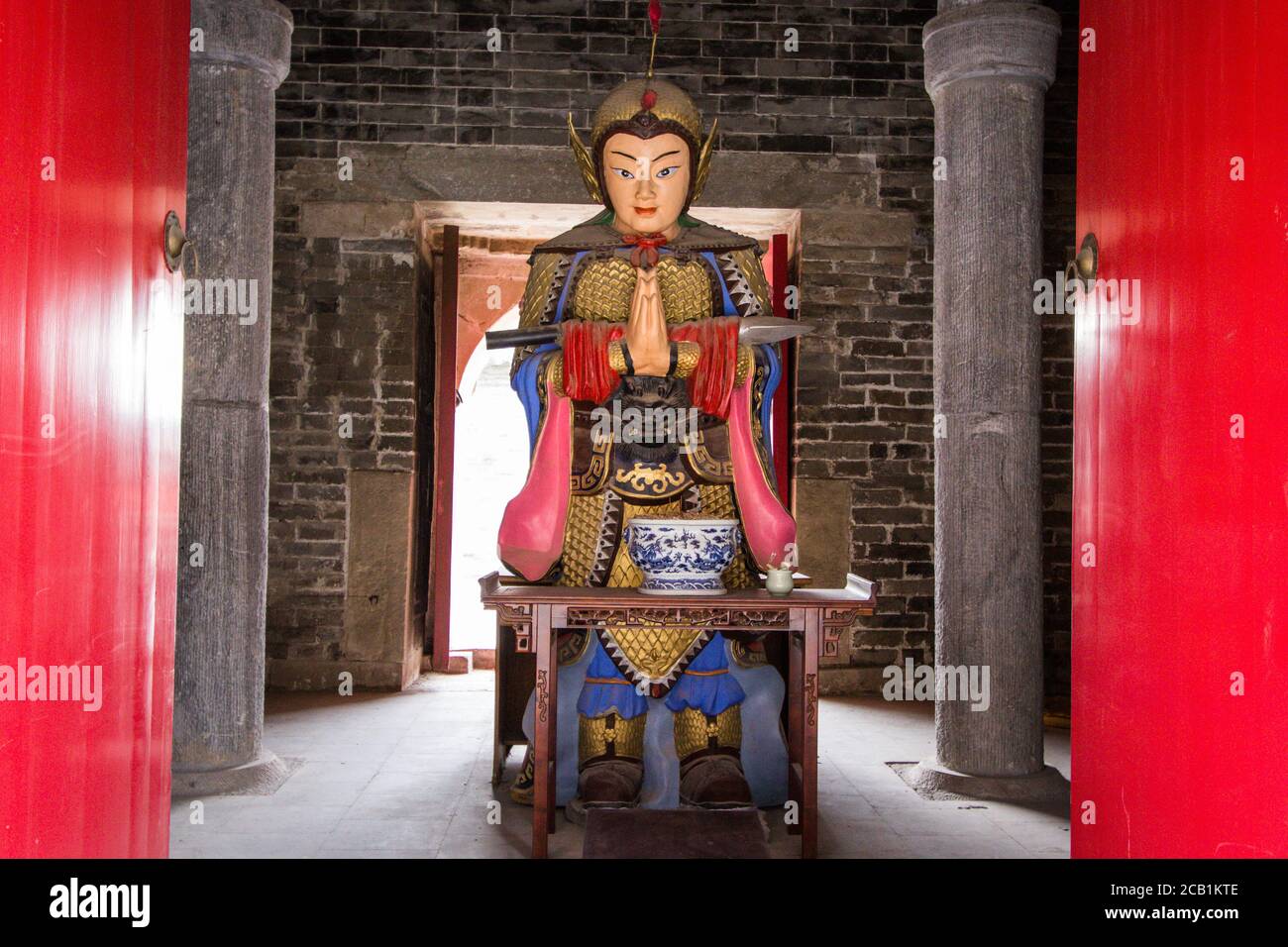 Statue of a deity at a Taoist temple Stock Photo - Alamy