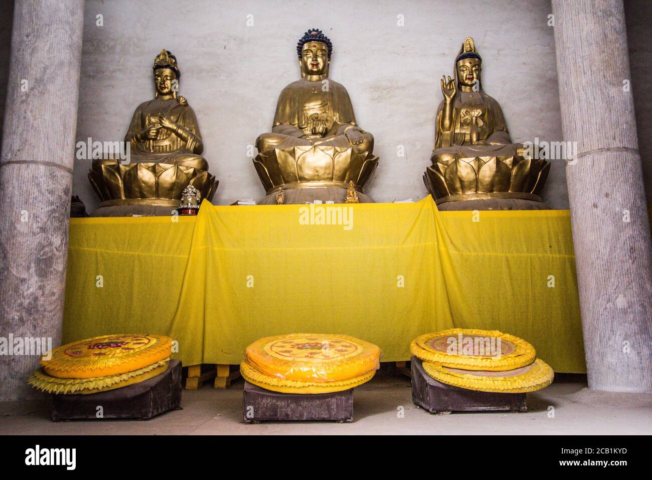 Shrine with golden statues of deities at a Taoist temple Stock Photo ...
