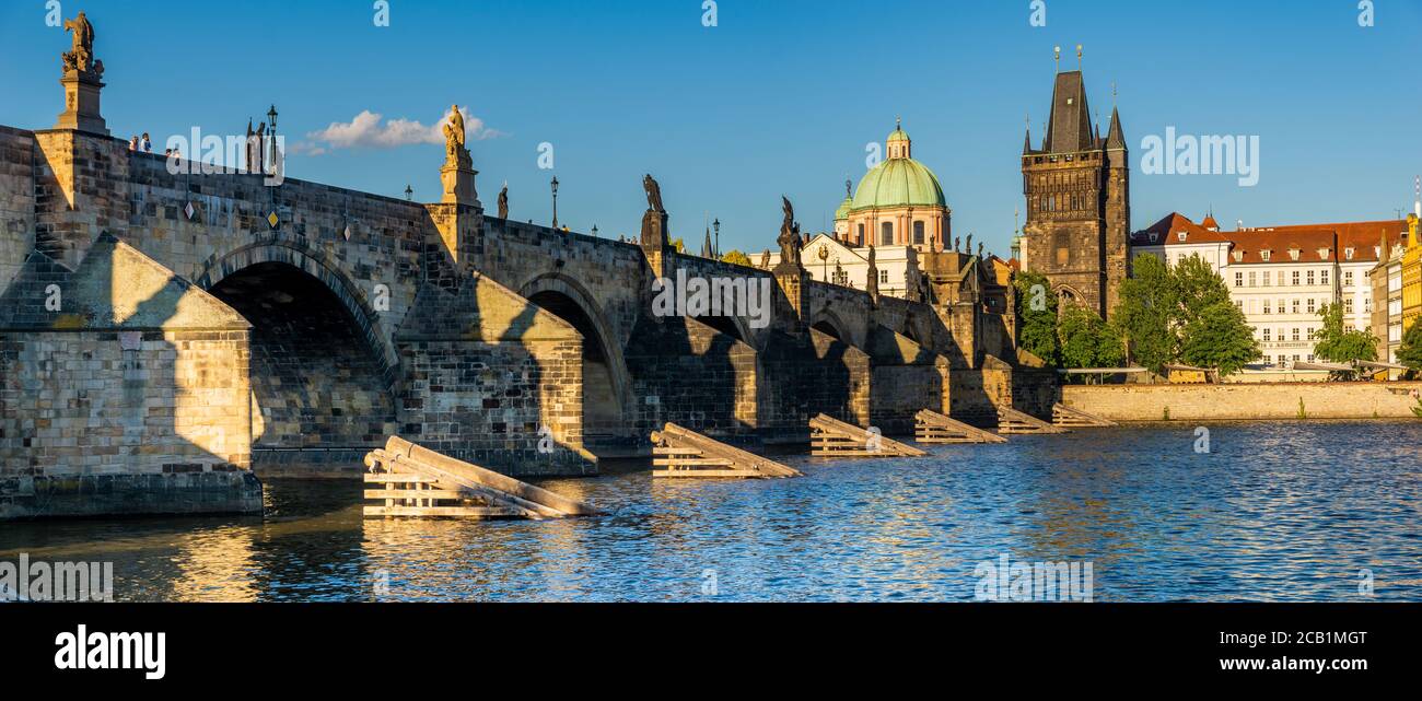 Famous Charles Bridge In Prague on a beautiful summer afternoon Stock ...