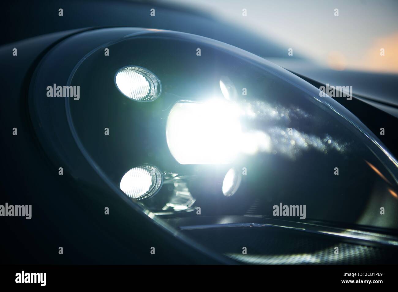 Bright And Shiny Front LED Headlight Of Passenger Car At Night Stock ...