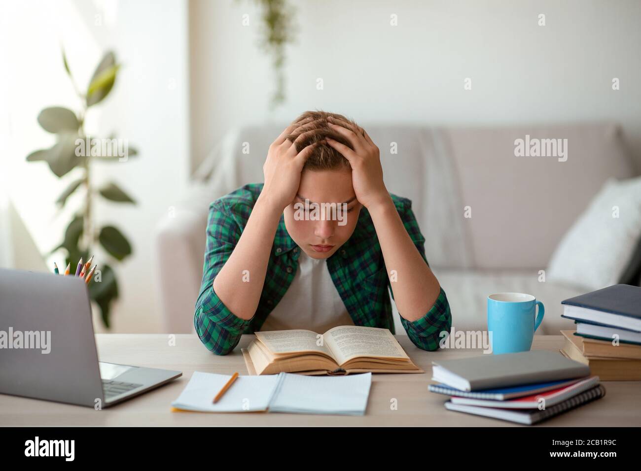 Exhausted student studying hi-res stock photography and images - Alamy