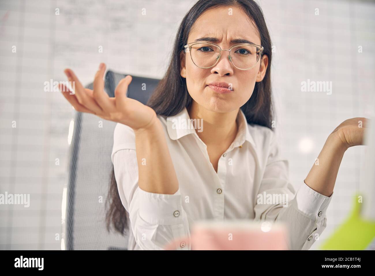 Woman staring distance office hi-res stock photography and images - Alamy