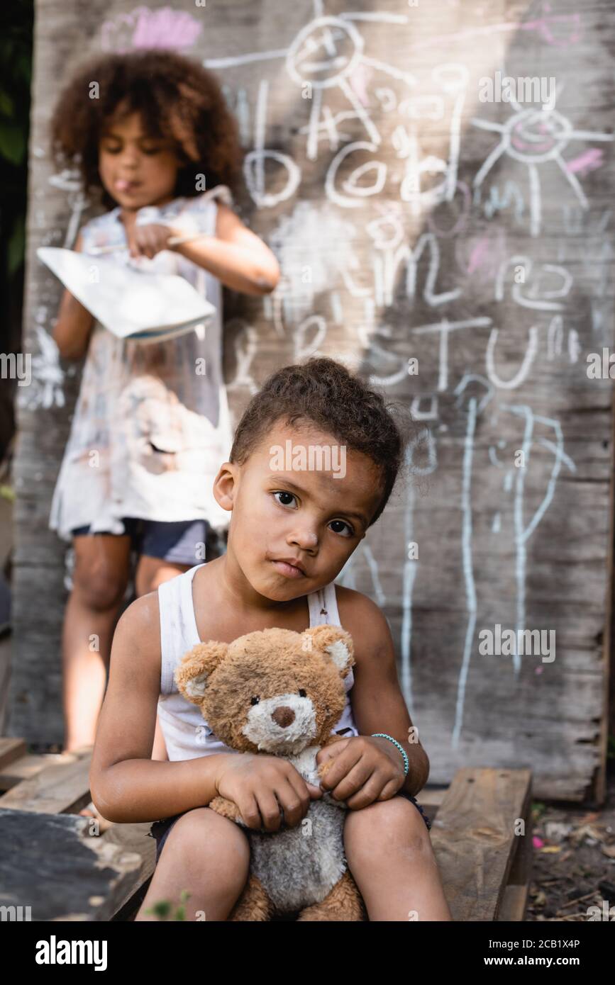 Poor girl and torn clothes hi-res stock photography and images - Alamy
